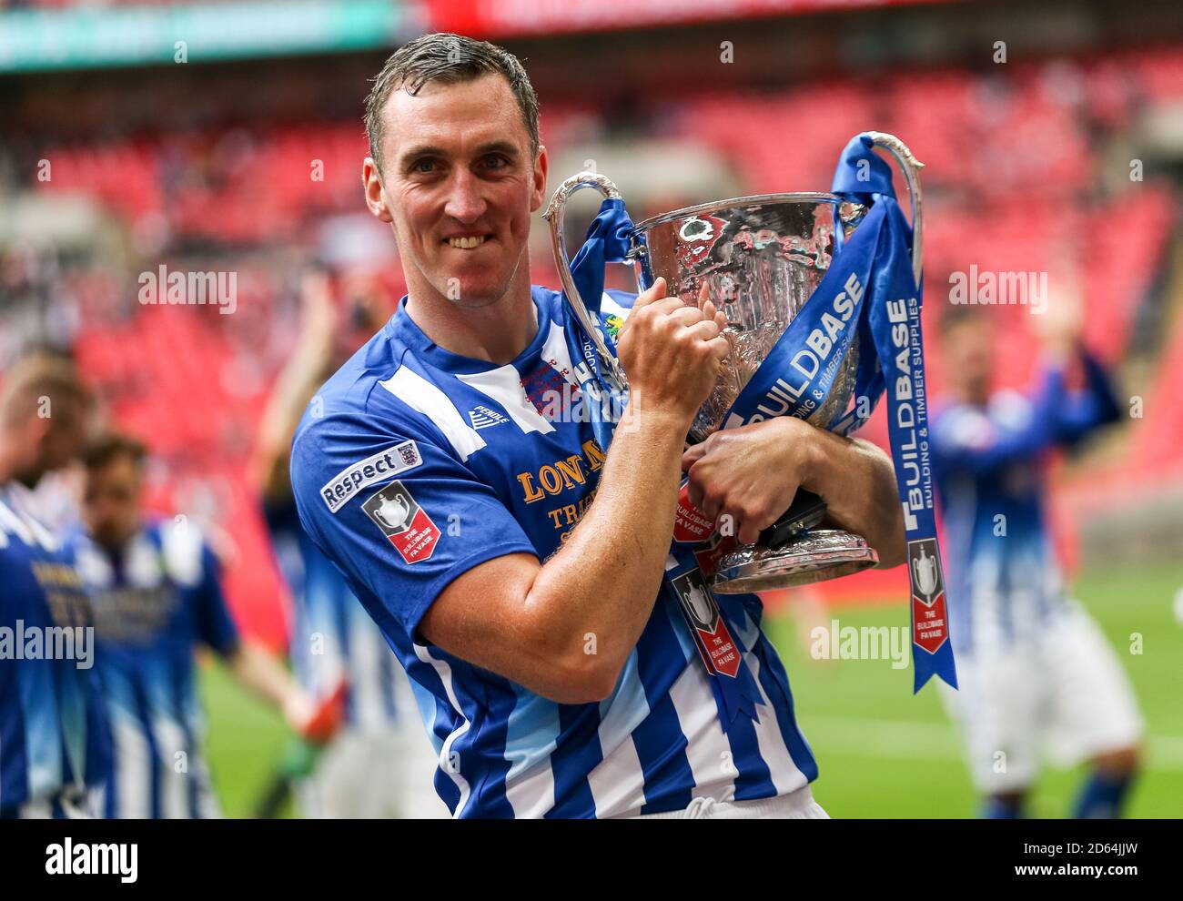 Chertsey Town's John Pomroy celebrates with the FA VaseTrophy Stock ...