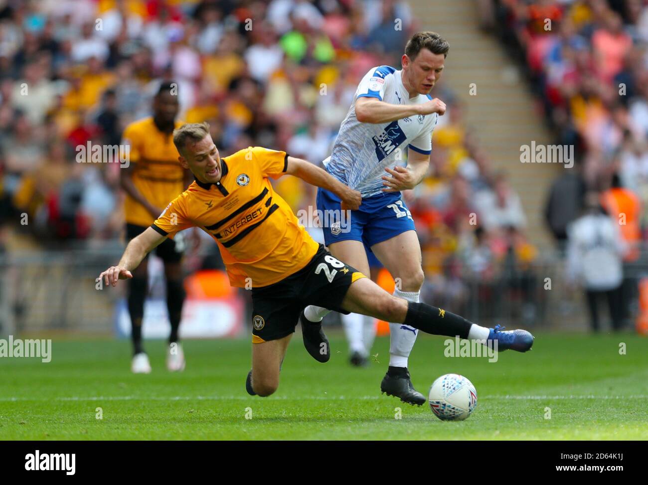 Newport County's Mickey Demetriou (left) and Tranmere Rovers' Connor ...