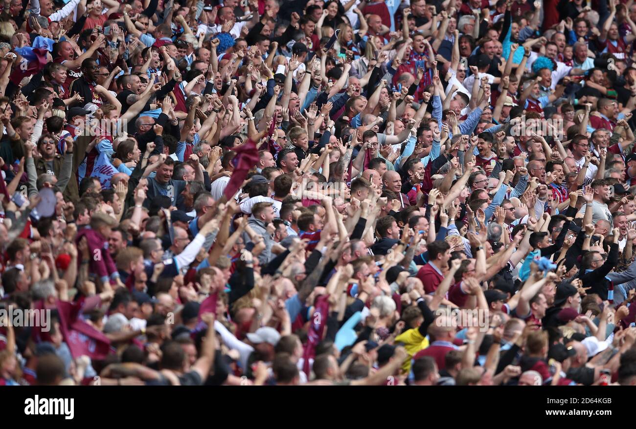 Aston Villa fans celebrate their side's second goal of the game, scored ...