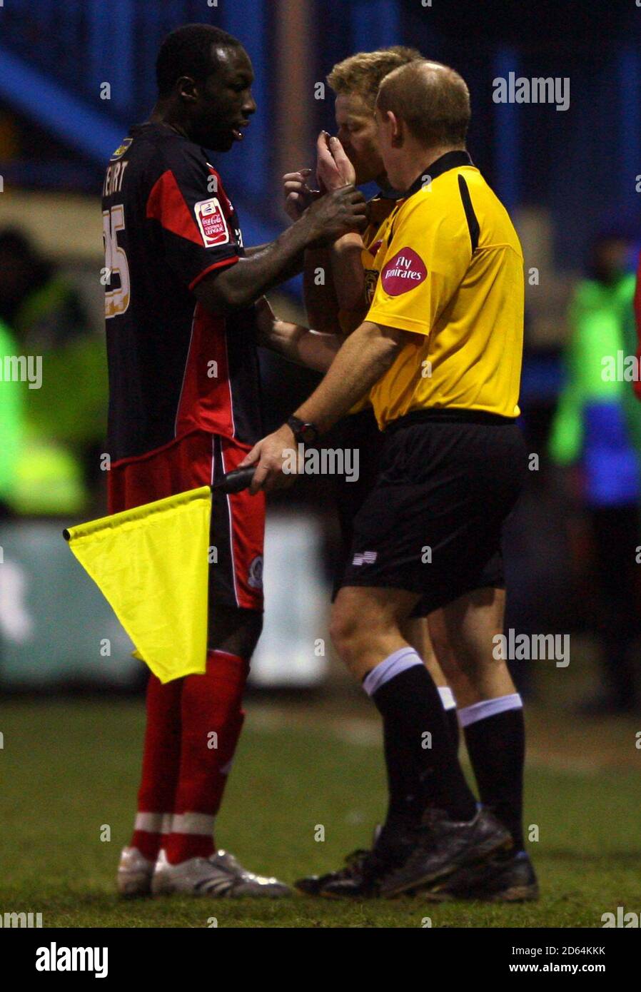 Queens Park Rangers' Damion Stewart checks on referee Michael Jones ...
