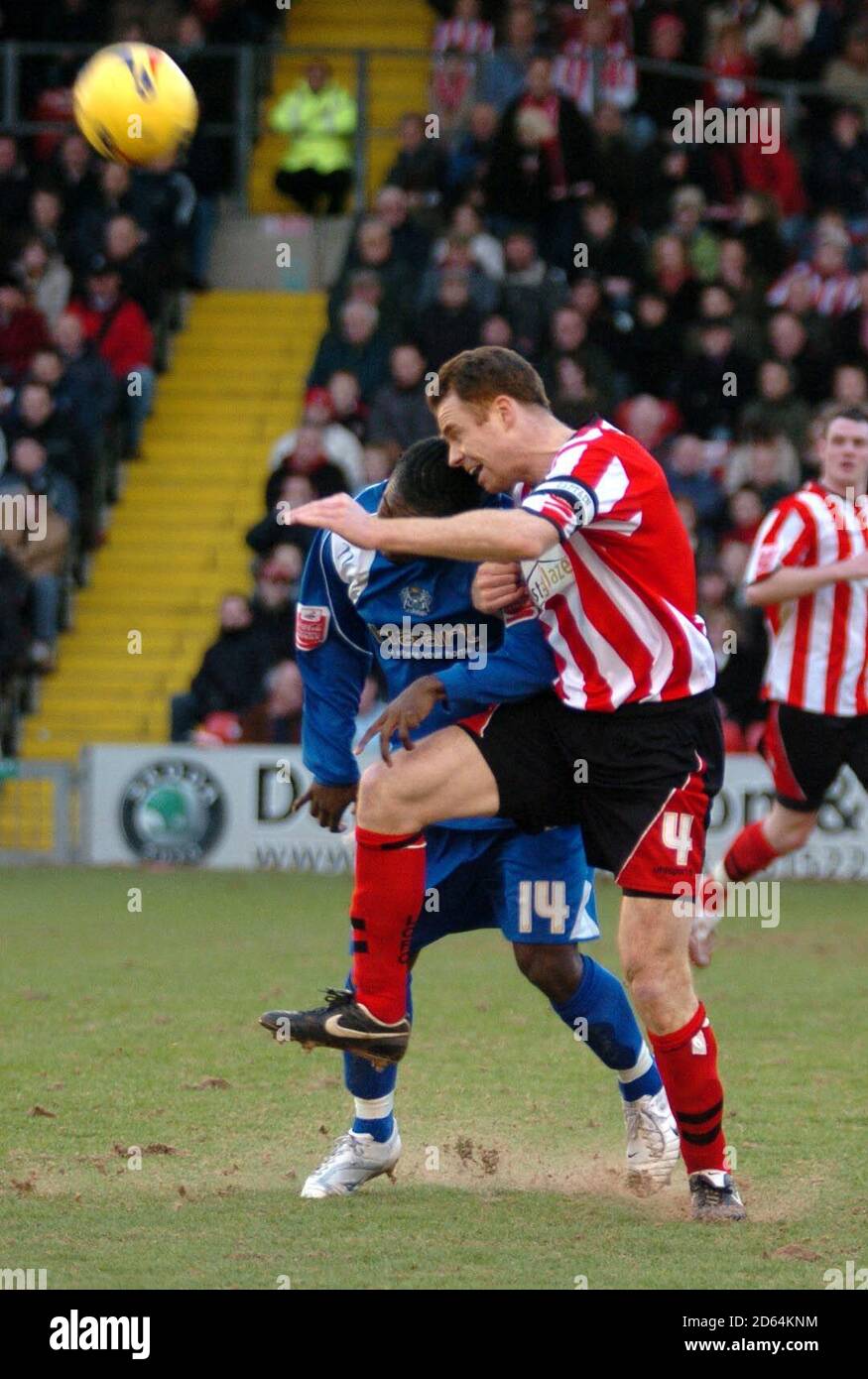 Lincoln City's captain Adie Moses (r) and Peterborough United's Aaron ...