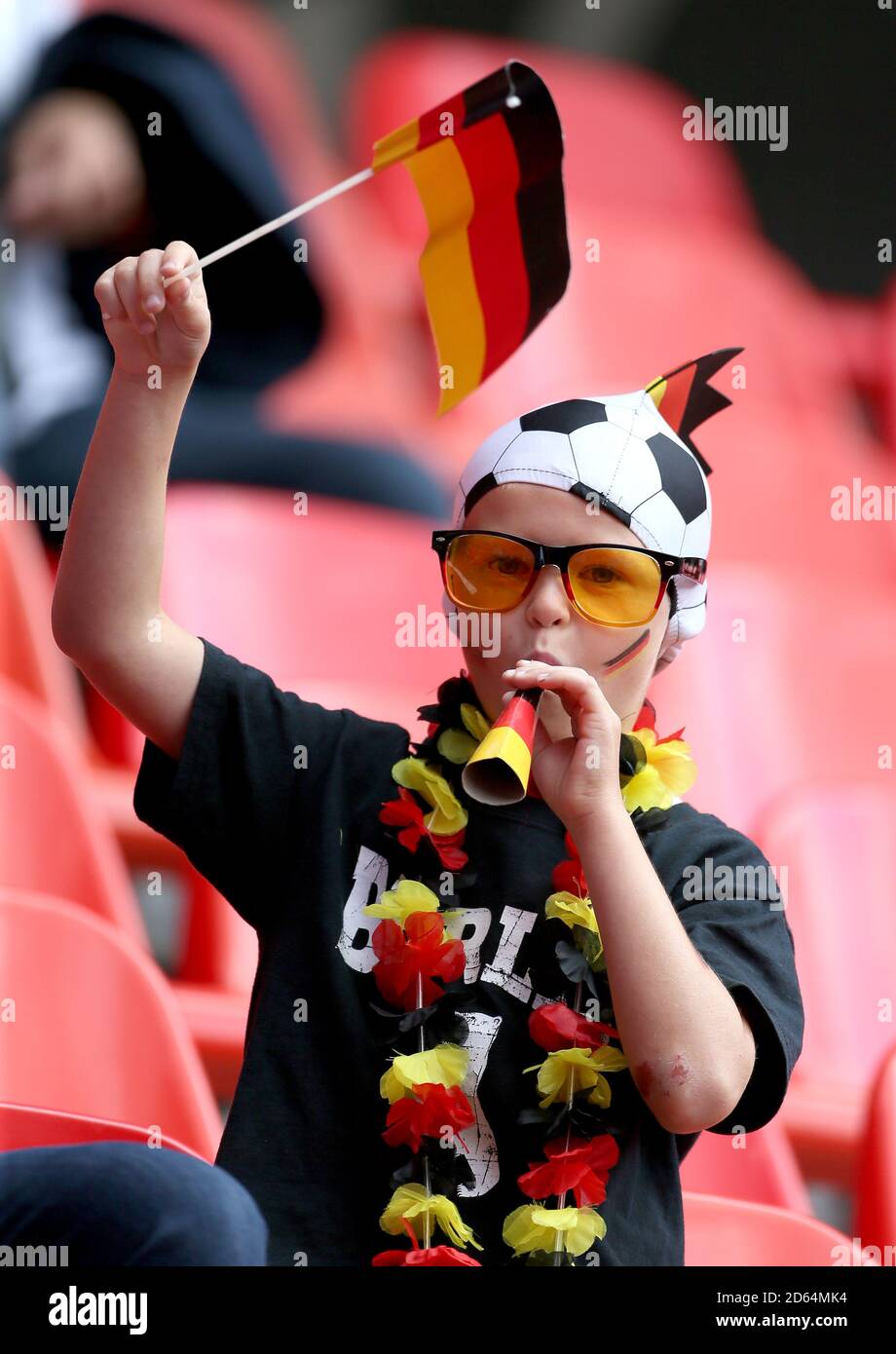 A young Germany fan shows support for their team in the stands Stock ...