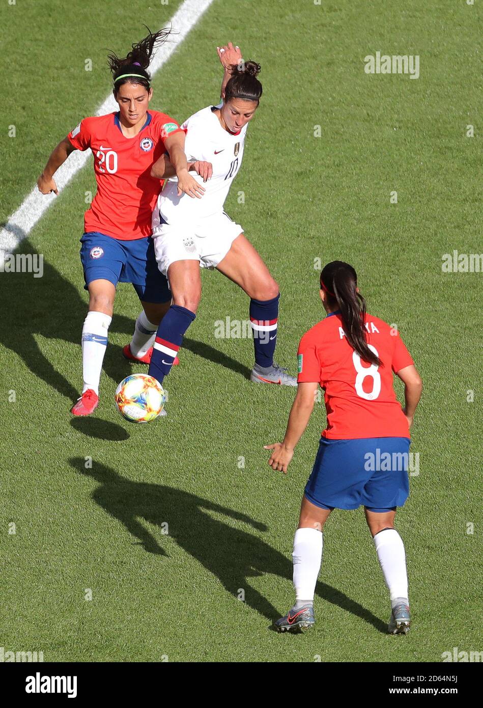 Chile's Daniela Zamora (left) and USA's Carli Lloyd battle for the ball ...
