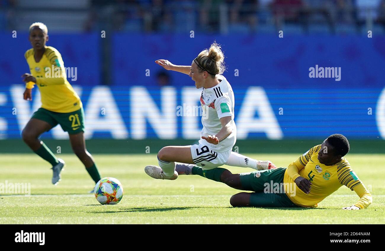 Germany's Svenja Huth (centre) reacts to a challenge from South Africa ...