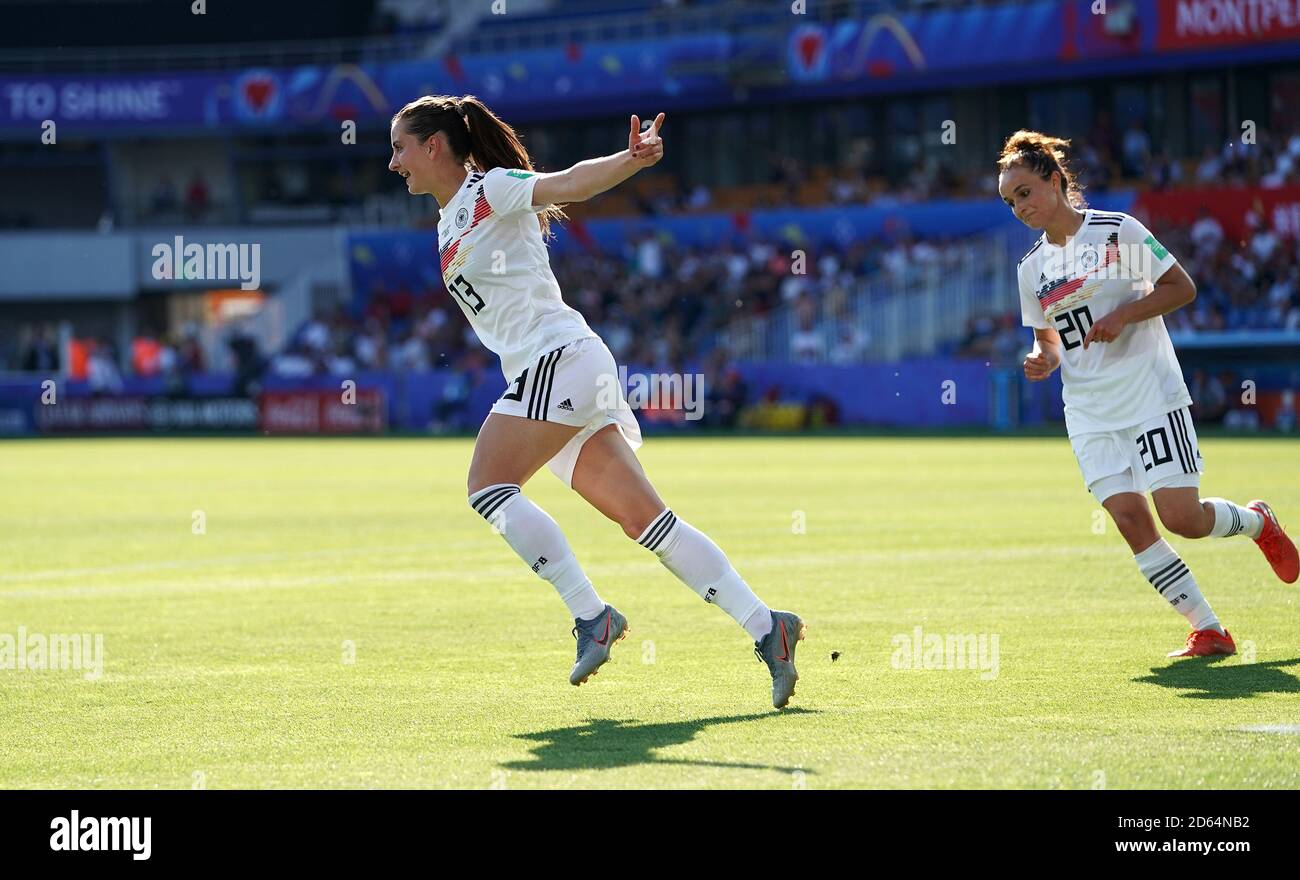 Germany's Sara Dabritz (left) celebrates scoring her side's second goal ...