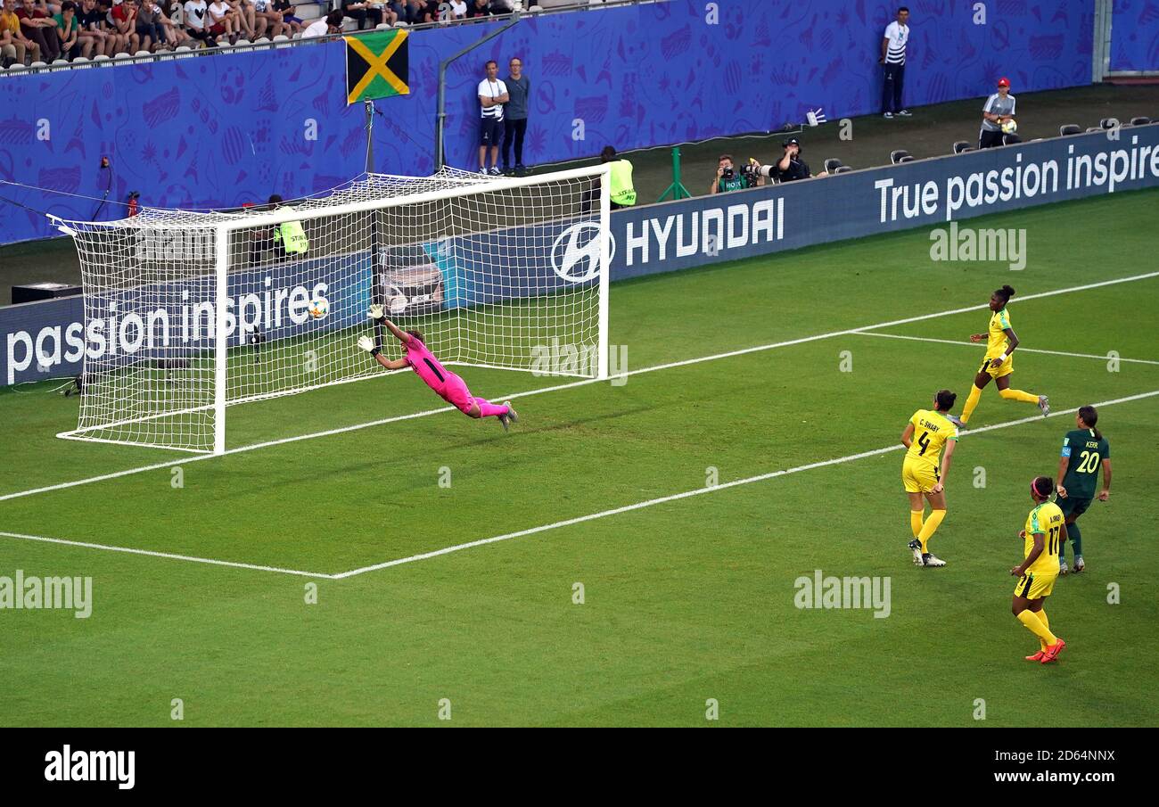 Australia's Sam Kerr (right) scores her side's first goal of the game ...