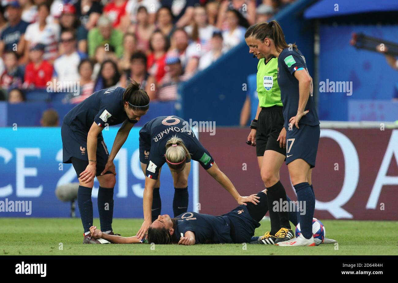 France's Amel Majri reacts on the floor Stock Photo - Alamy