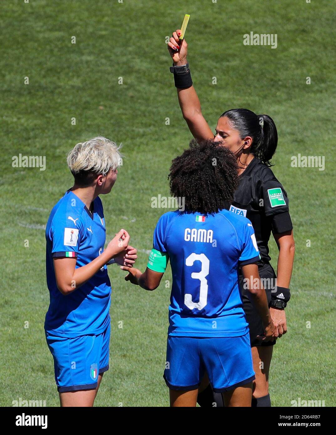 Italy's Elena Linari is shown the yellow card by referee Claudia ...