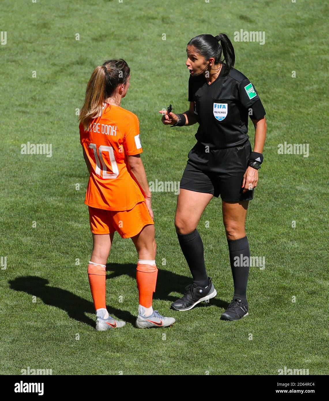 Referee Claudia Umpierrez speaks with Netherlands' Danielle van de Donk ...
