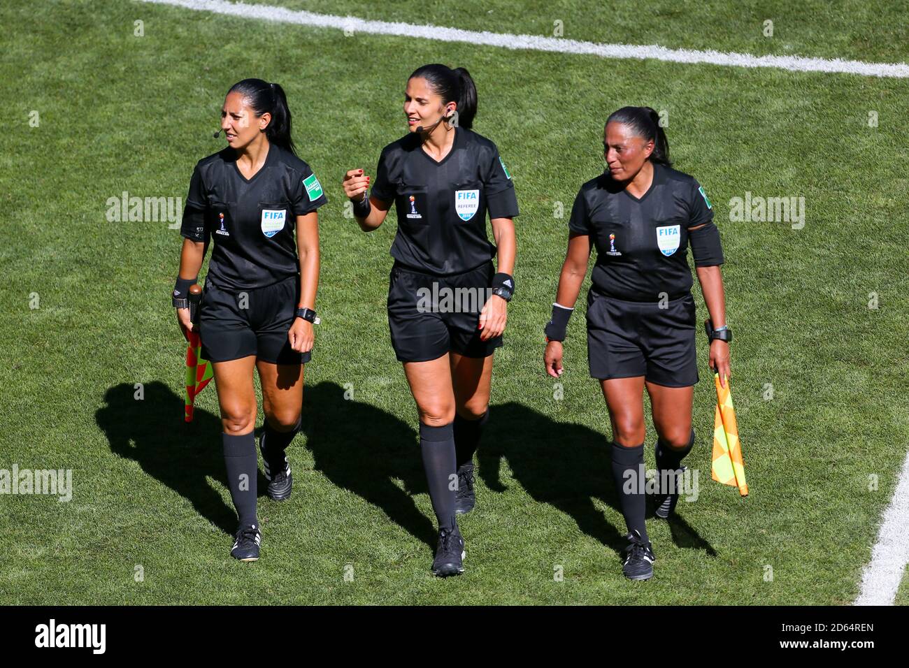 Referee Claudia Umpierrez (centre) with officials after the final ...