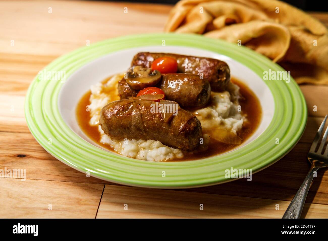 British bangers and mash sausage and mashed potatoes with onion gravy ...