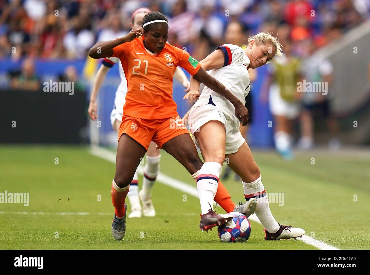 Netherlands' Lineth Beerensteyn (left) and USA's Abby Dahlkemper battle ...