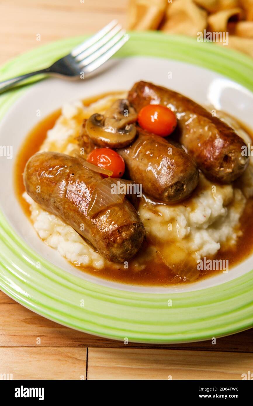 British bangers and mash sausage and mashed potatoes with onion gravy ...