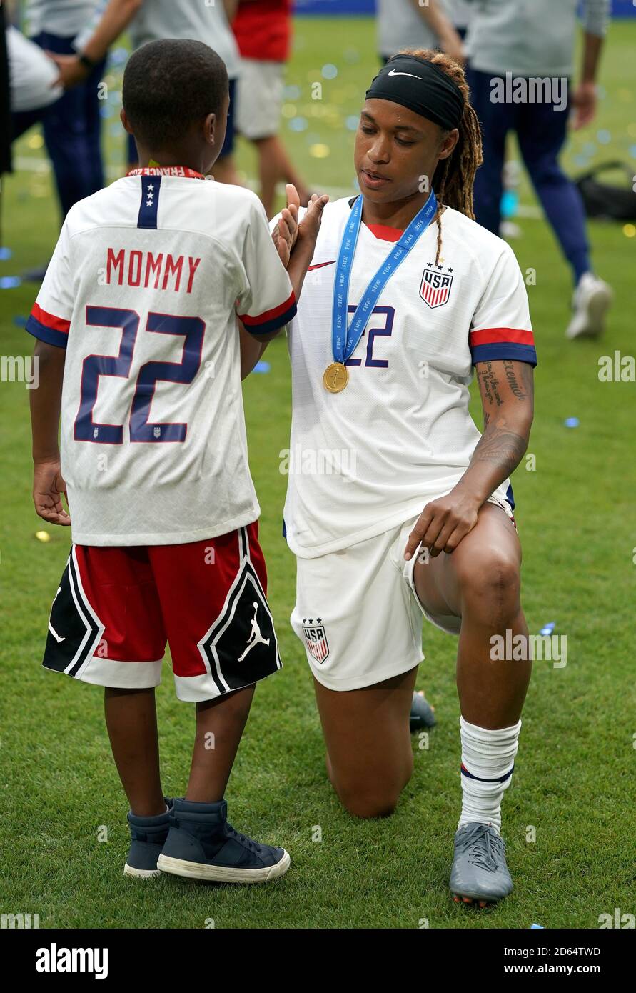 USA's Jessica McDonald celebrates with her son Jeremiah after the game ...