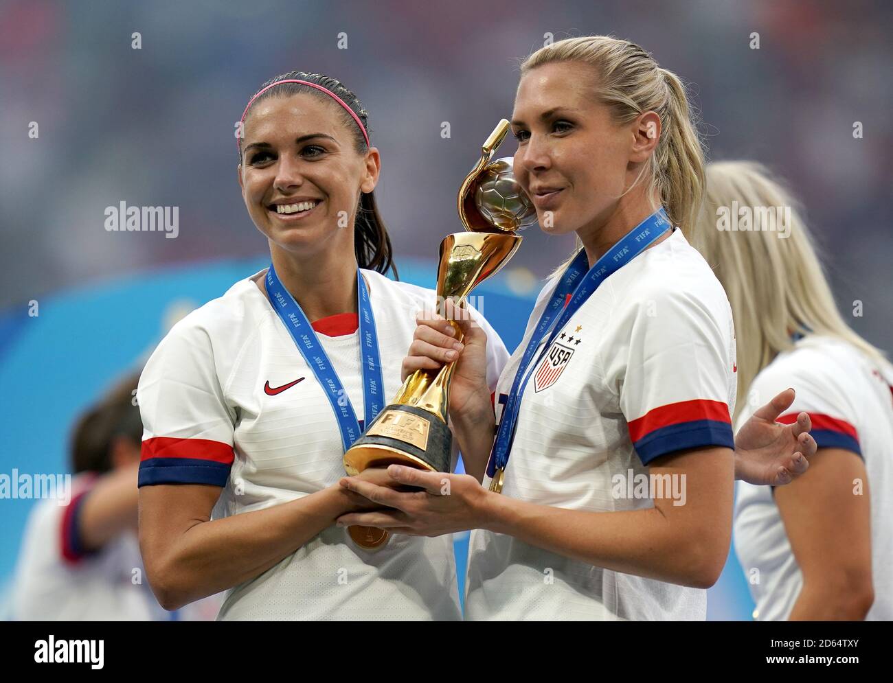 USA's Alex Morgan (left) and Allie Long celebrate with the FIFA Women's ...