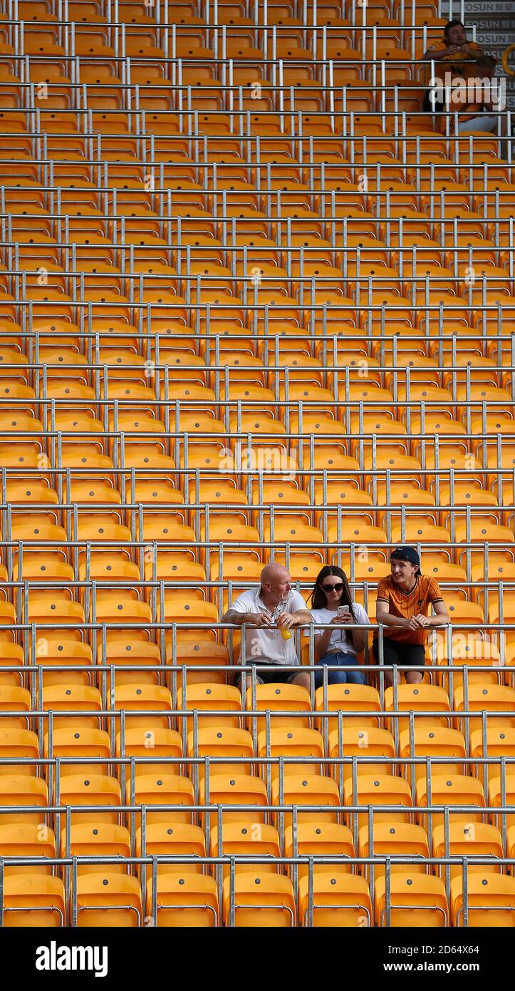 Wolves fans sit in the new safe standing area of Wolverhampton ...