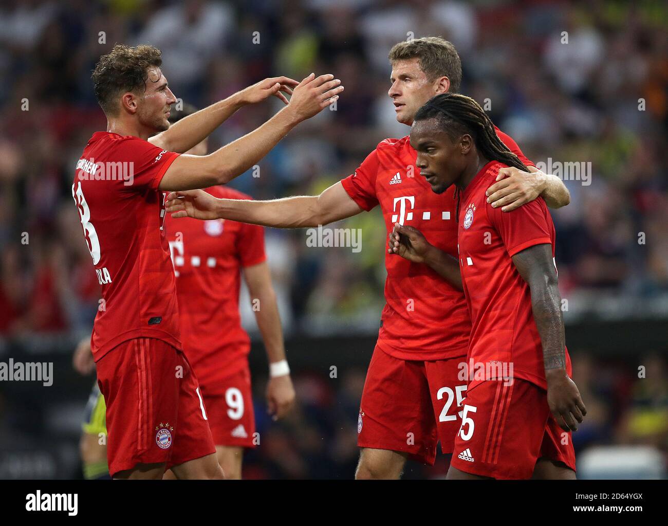 Bayern Munich's Thomas Muller (centre) celebrates scoring his side's ...