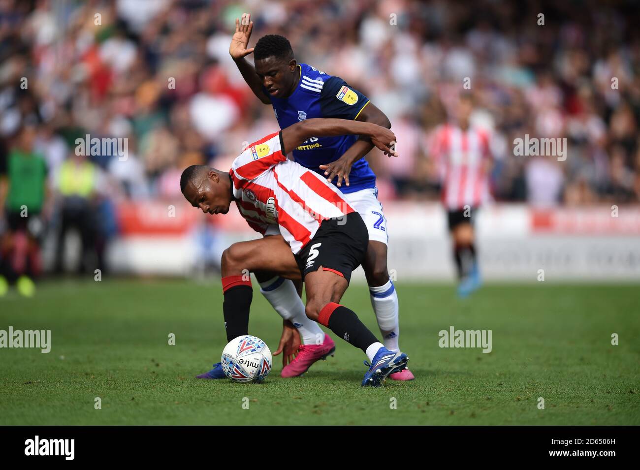 Birmingham City's Wes Harding (left) and Brentford's Ethan Pinnock ...