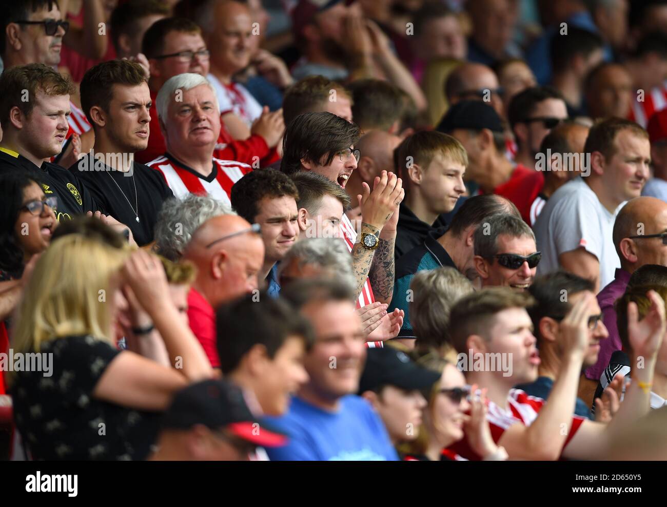 Brentford fans in the stands Stock Photo - Alamy