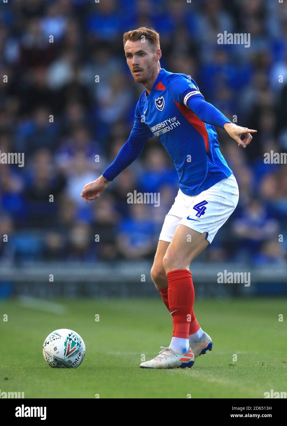 Portsmouth's Tom Naylor in action Stock Photo - Alamy