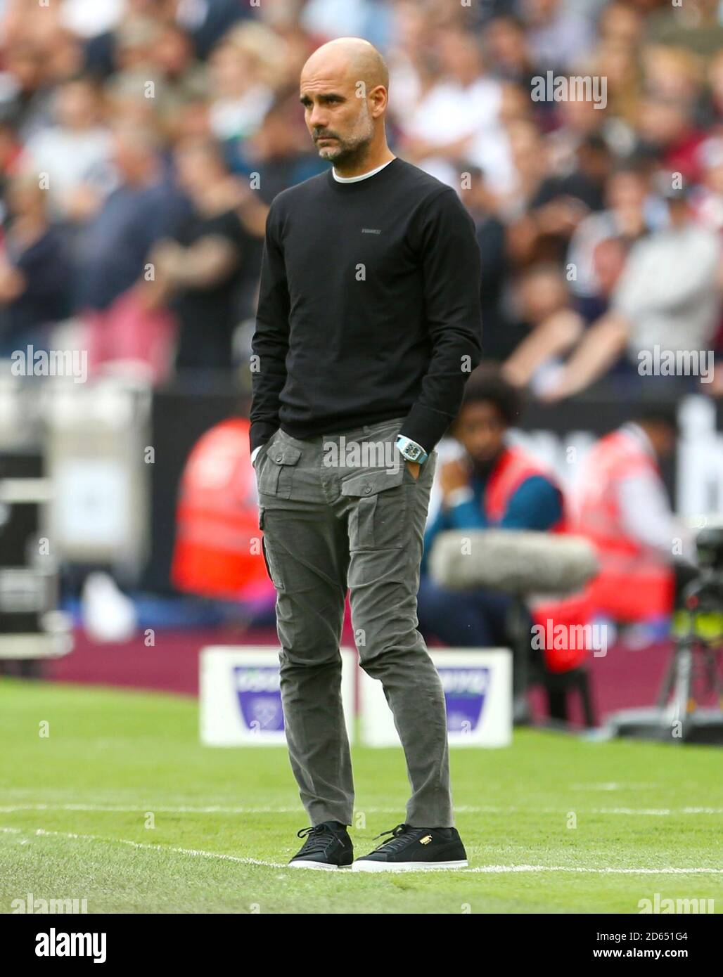Manchester City manager Pep Guardiola on the touchline Stock Photo - Alamy