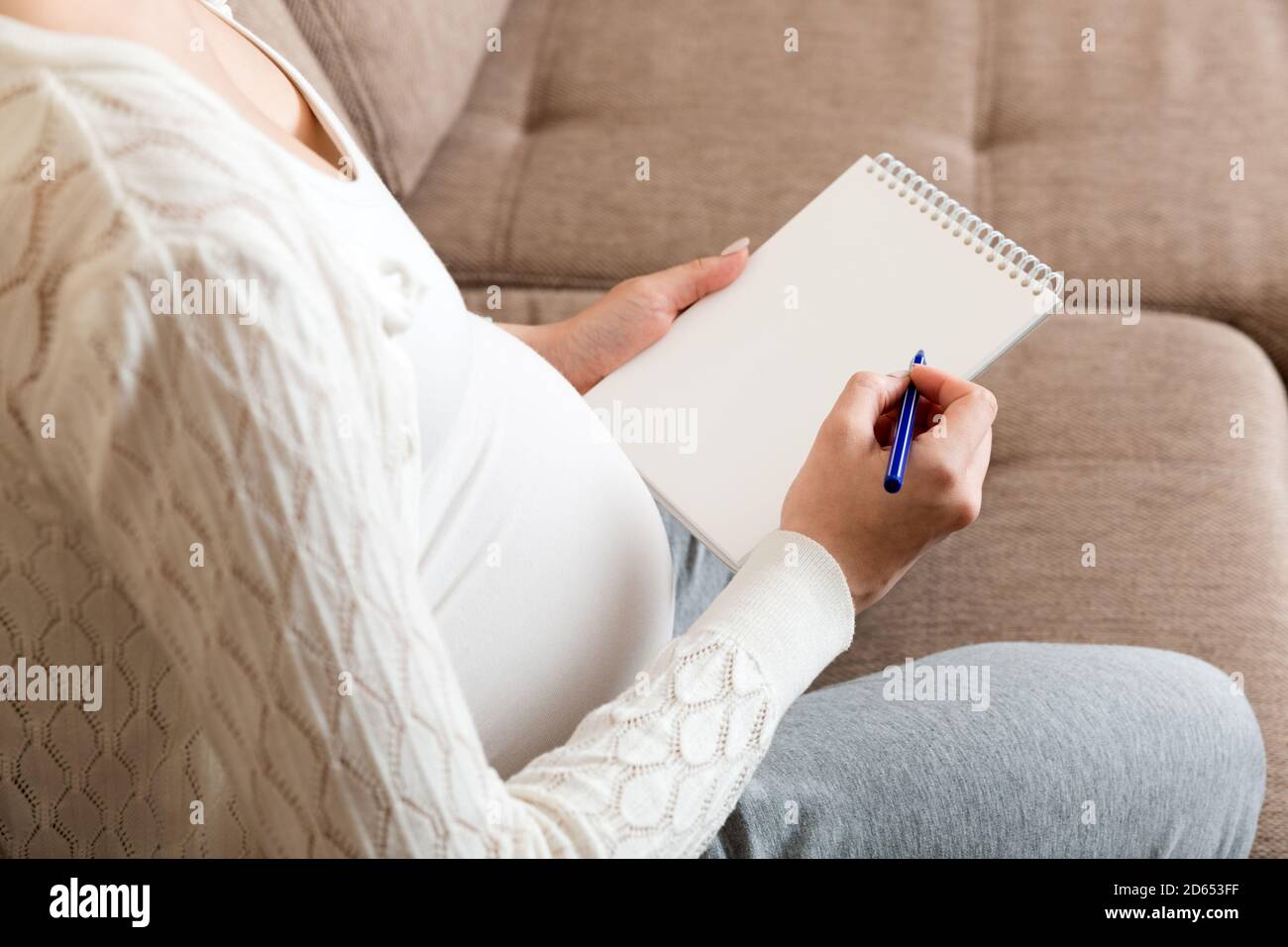 Child write list parent hi-res stock photography and images - Alamy