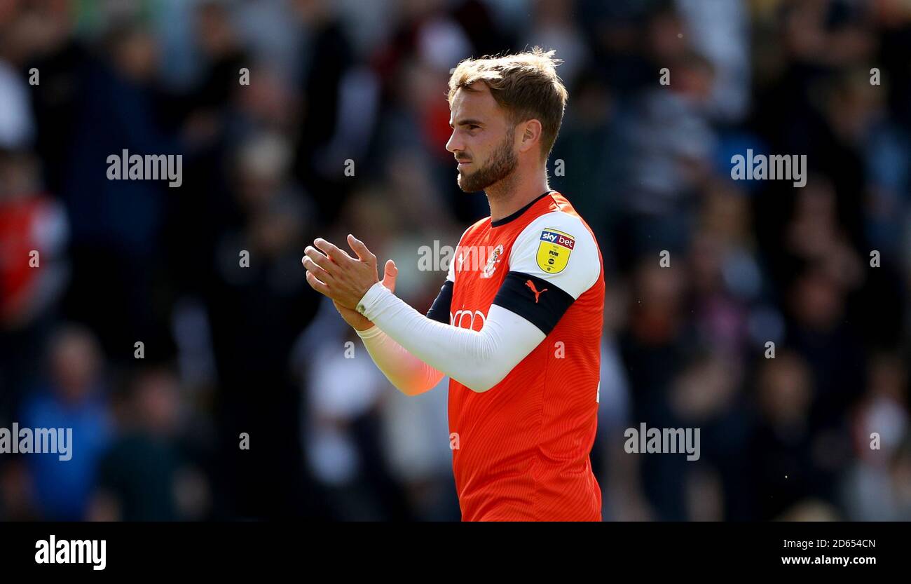 Luton Town's Andrew Shinnie applauds the fans after the final whistle ...