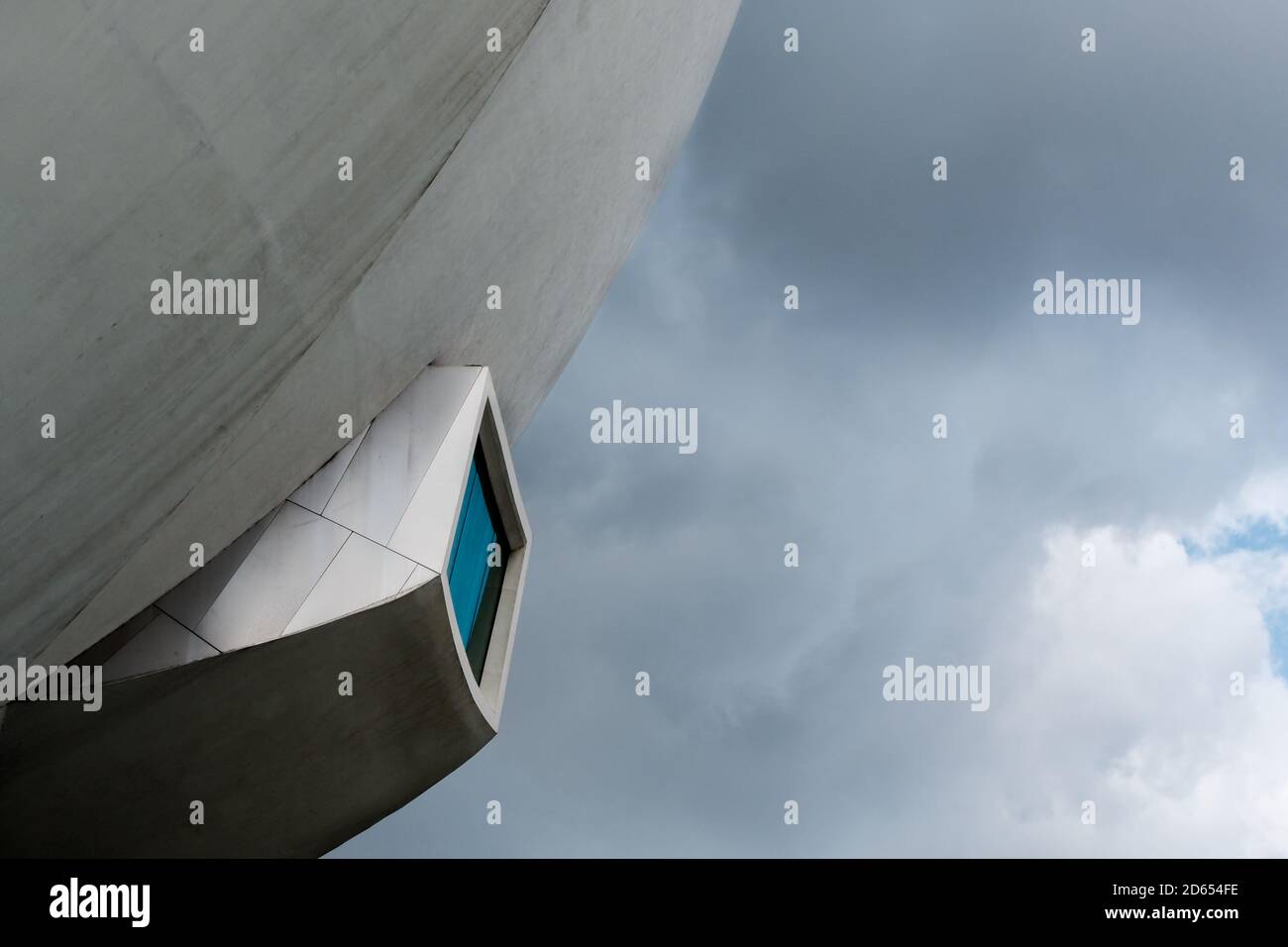 Architectural detail close-up of window protruding from concrete curved ...