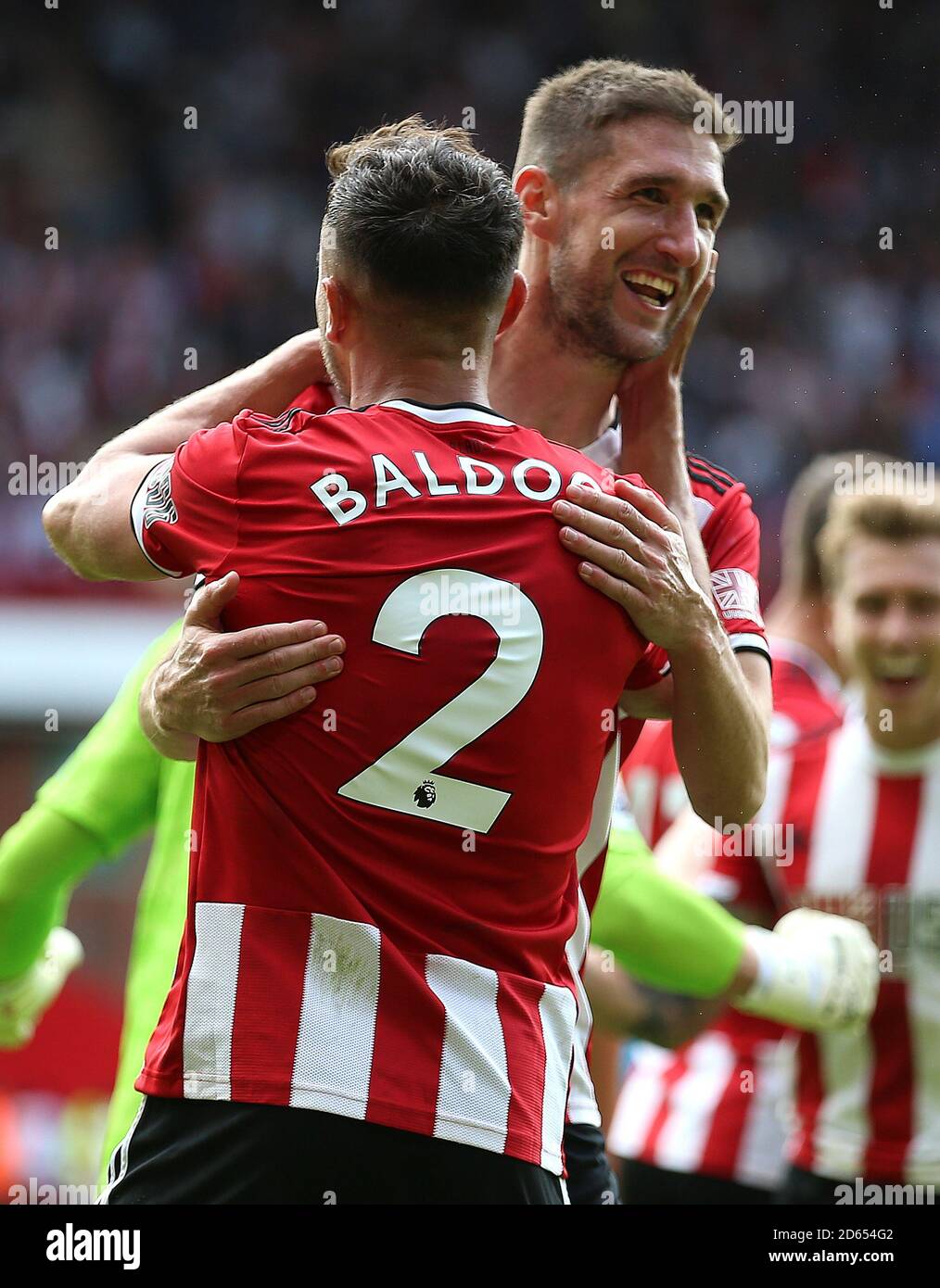 Sheffield United's George Baldock (left) and Chris Basham celebrate ...