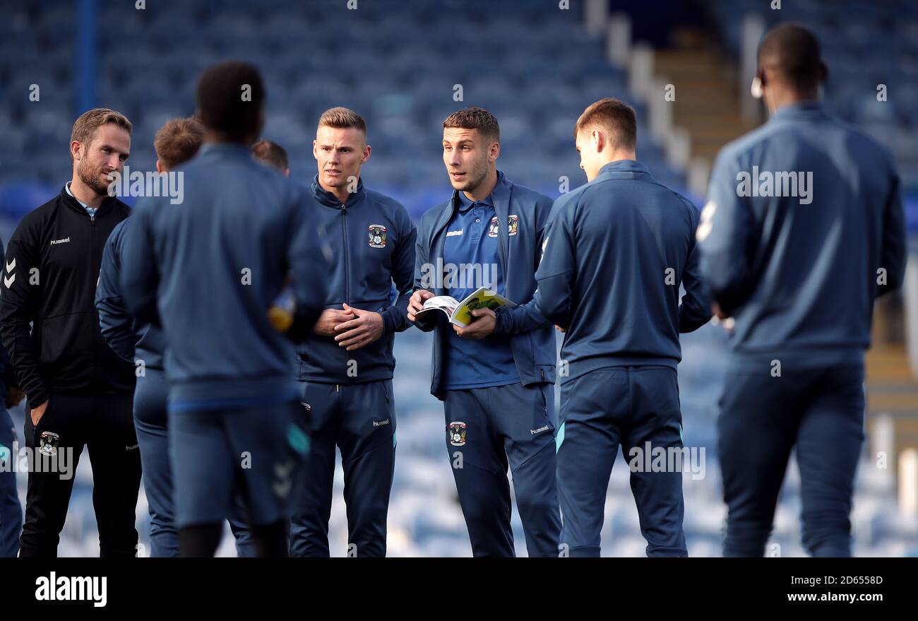Coventry City goalkeeper Ben Wilson (centre left) and Marko Marosi ...