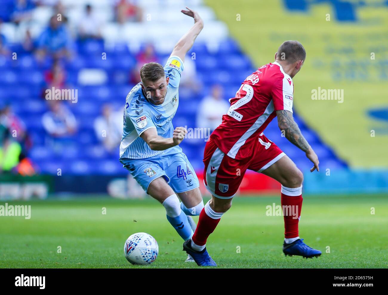 Coventry City's Charlie Wakefield and Gillingham's Barry Fuller during ...