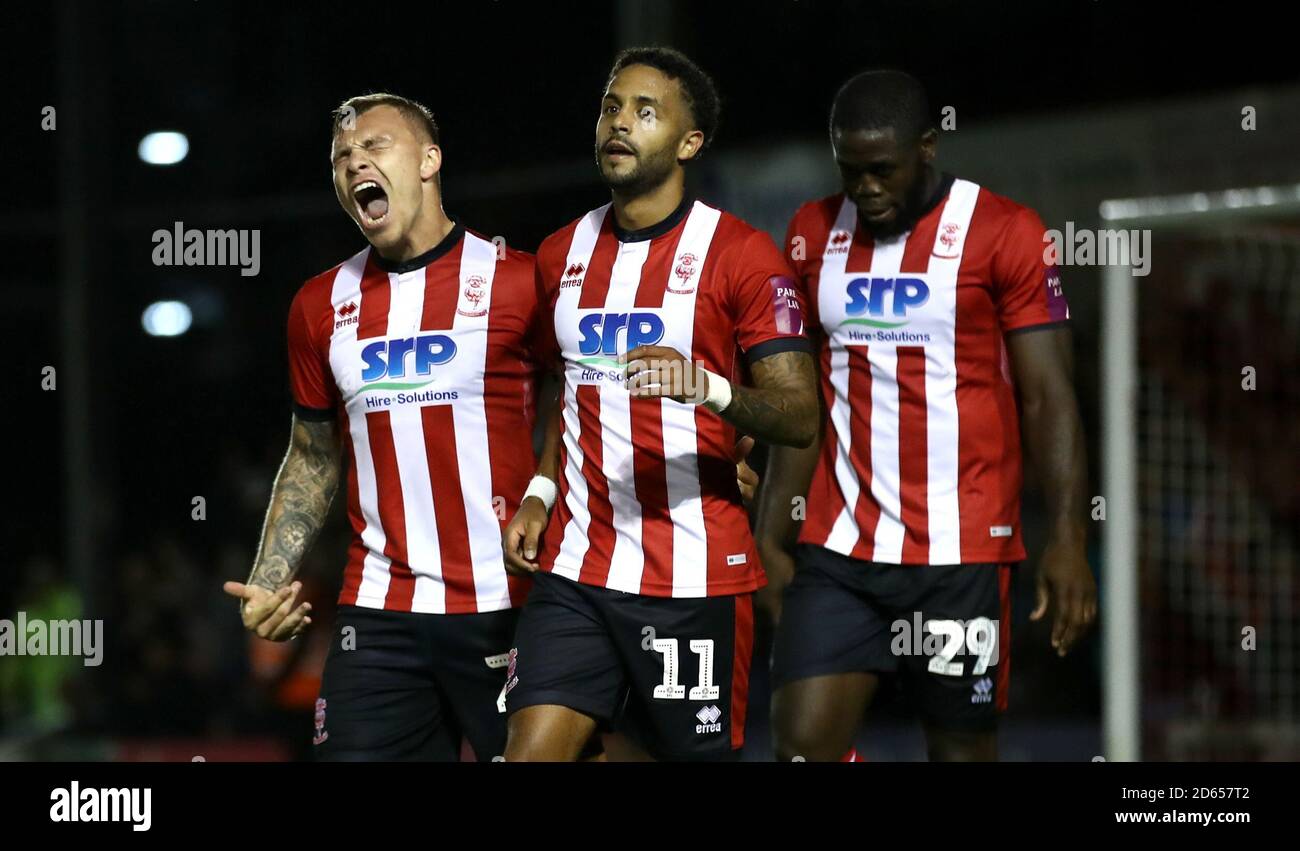 Lincoln City'ss Bruno Andrade (centre) celebrates scoring his side's ...