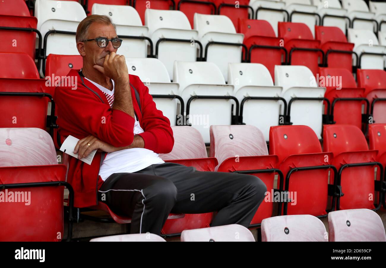 A Stevenage fan in the stands ahead of the match Stock Photo - Alamy