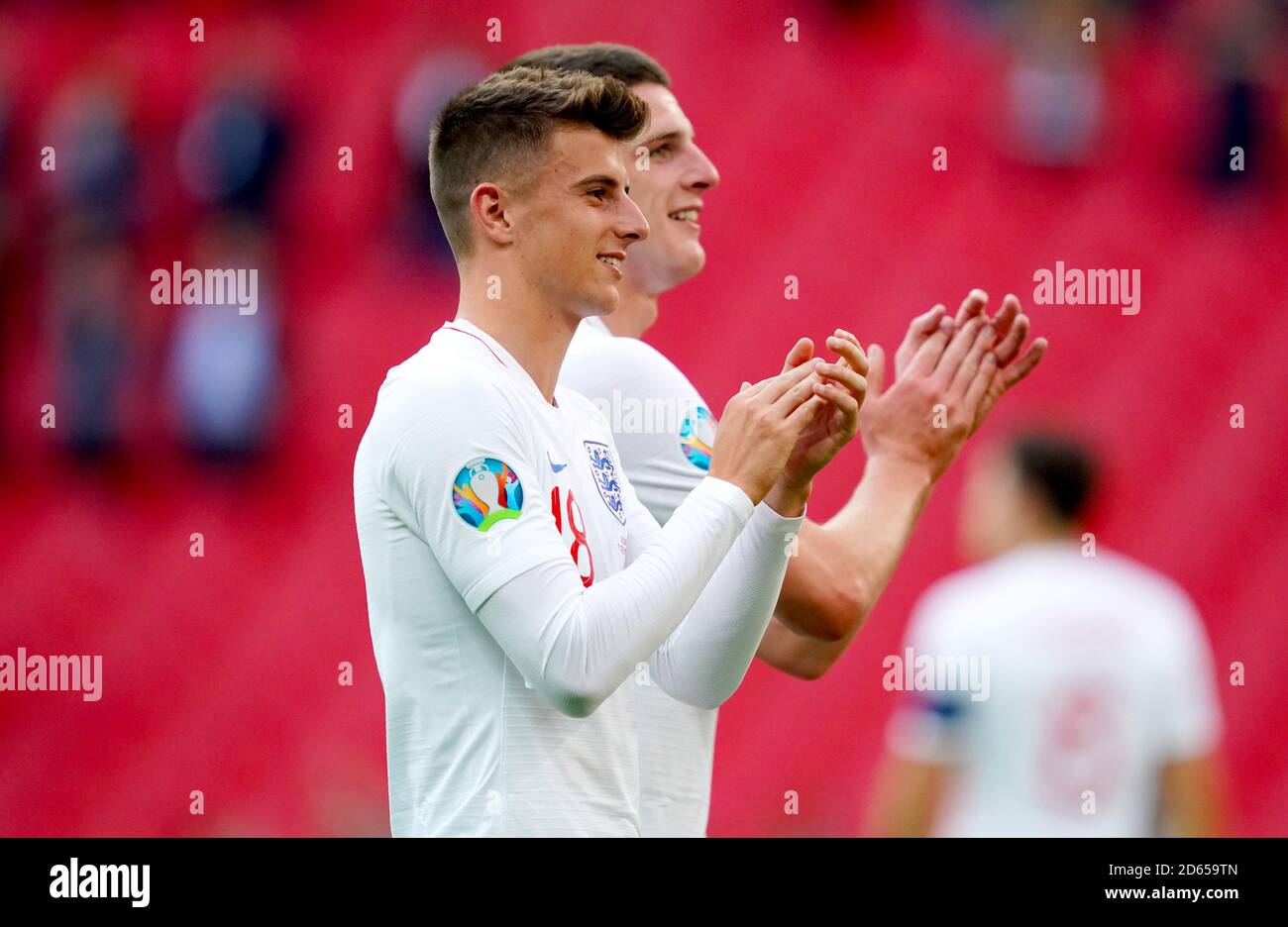England's Mason Mount (left) and Declan Rice applaud the fans after the ...
