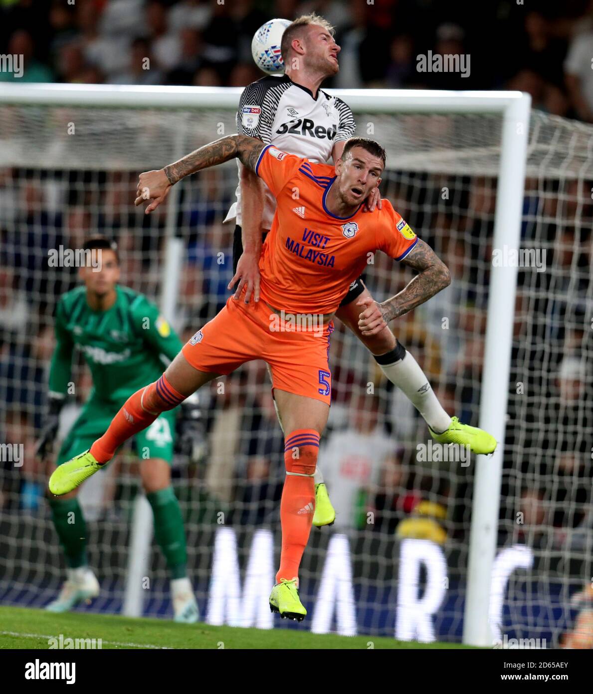 Derby County's Matt Clarke (back) and Cardiff City's Aden Flint Stock ...