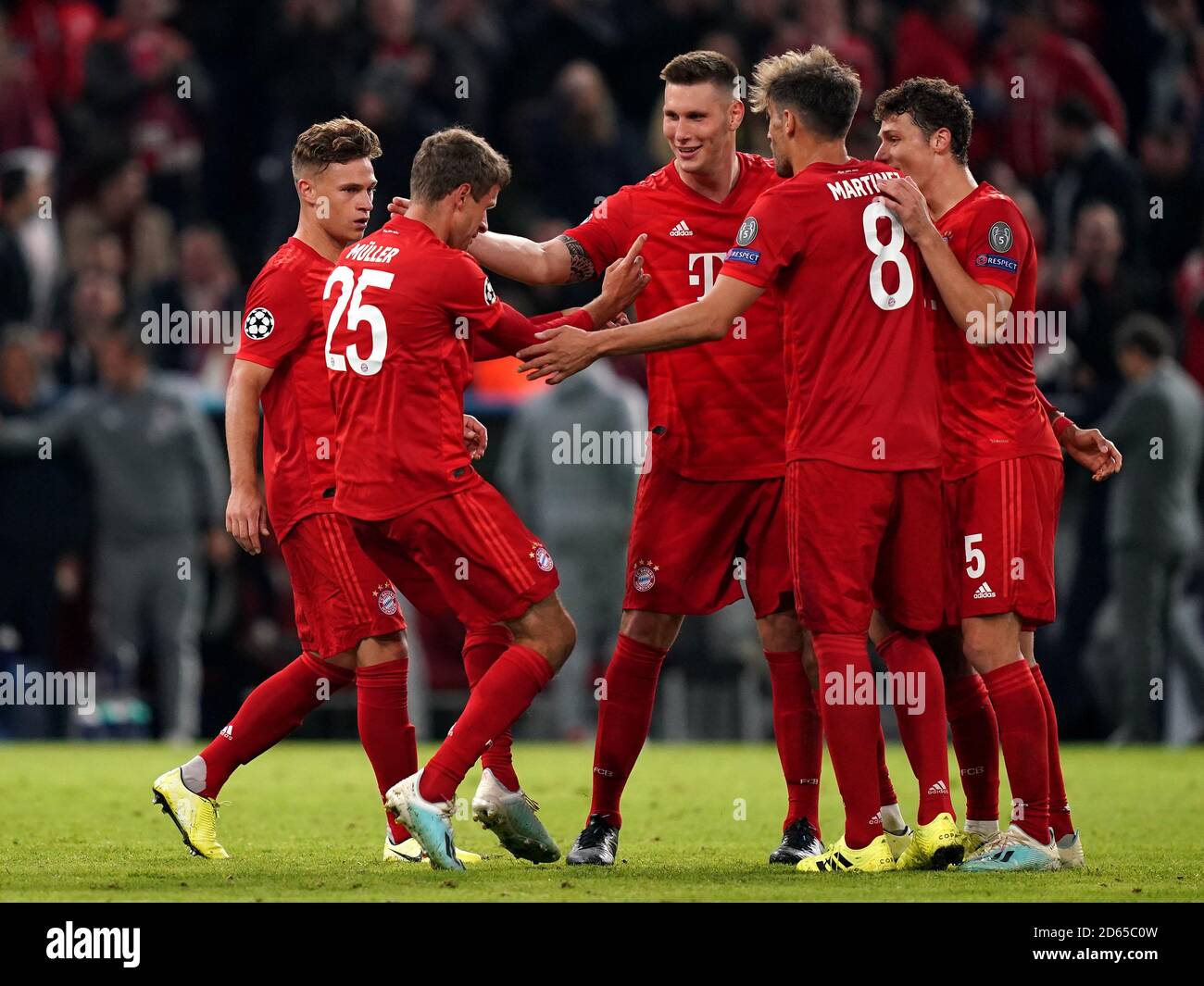 Bayern Munich's Thomas Muller (25) celebrates scoring his side's third ...