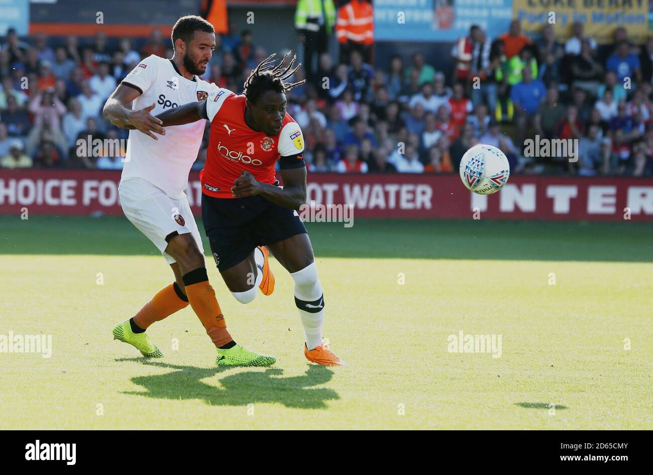 Hull City's Kevin Stewart (left) and Luton Town's Pelly Ruddock Mpanzu ...