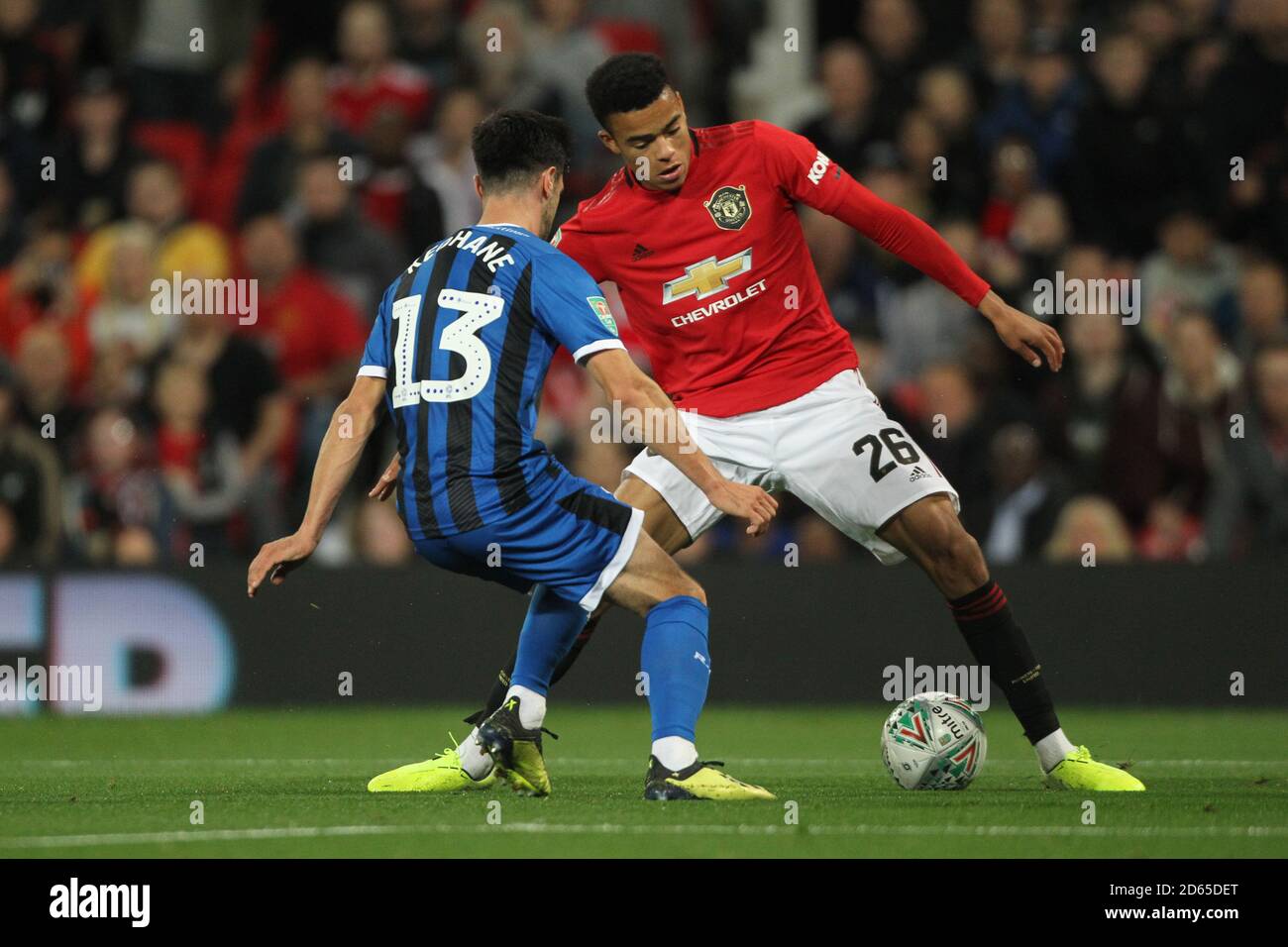 Manchester United's Mason Greenwood (right) and Rochdale's Jimmy ...