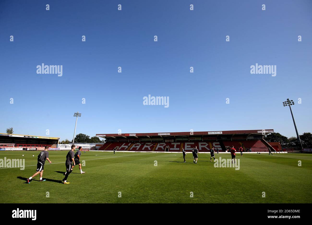 General view of the football stadium as players warm up hi-res stock ...