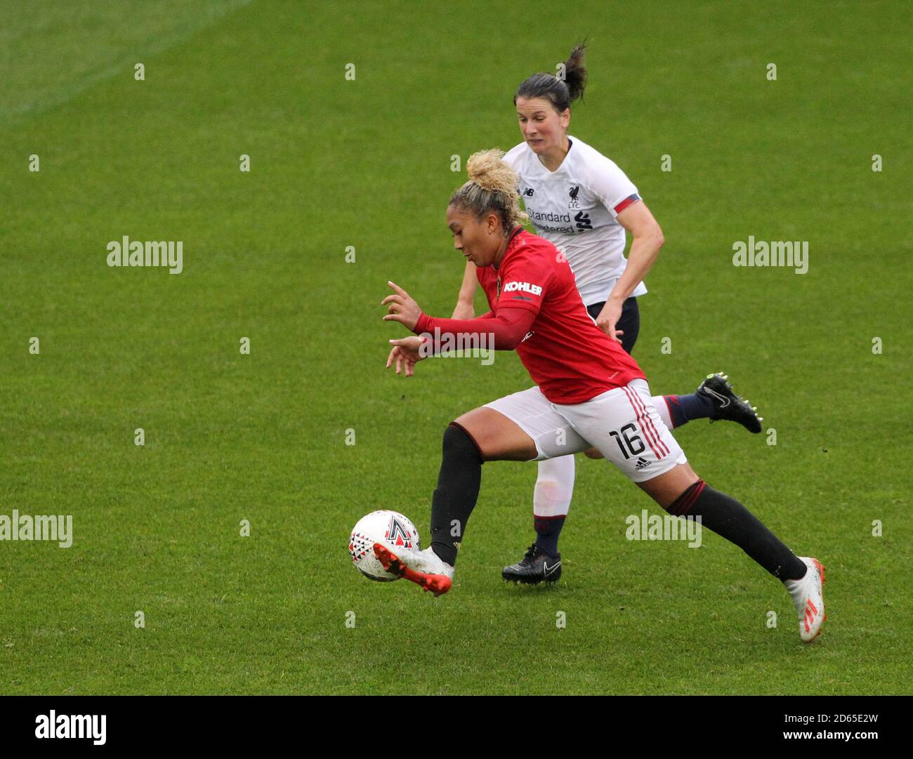Manchester United's Lauren James (left) and Liverpool's Niamh Fahey ...