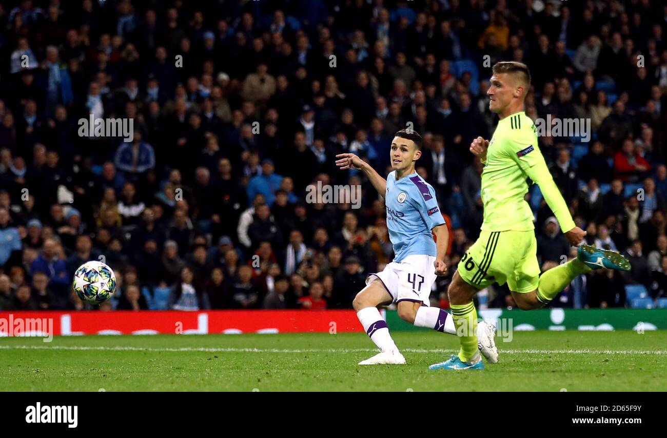 Manchester City's Phil Foden scores his side's second goal of the game ...