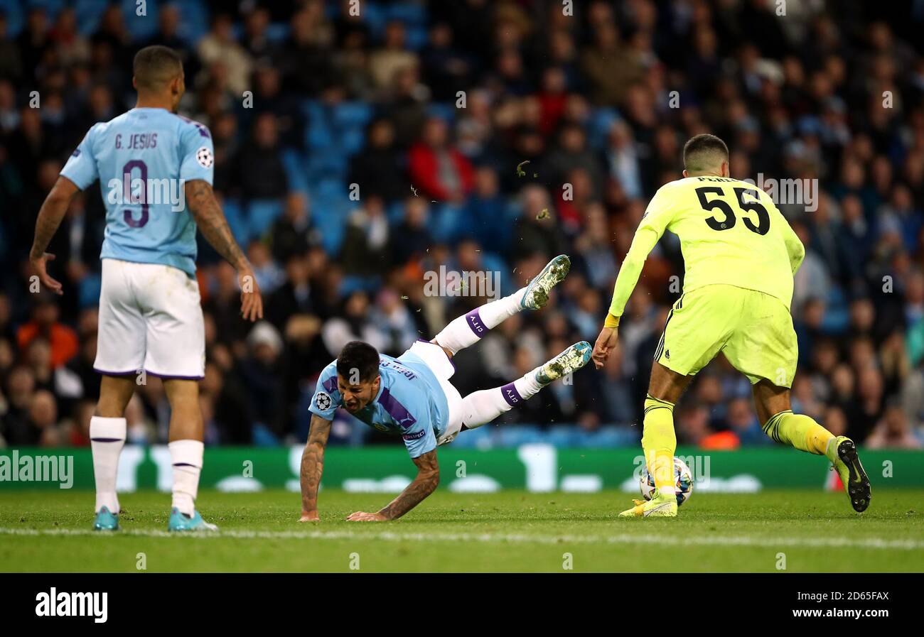 Dinamo Zagreb's Dino Peric tackles Manchester City's Joao Cancelo Stock ...
