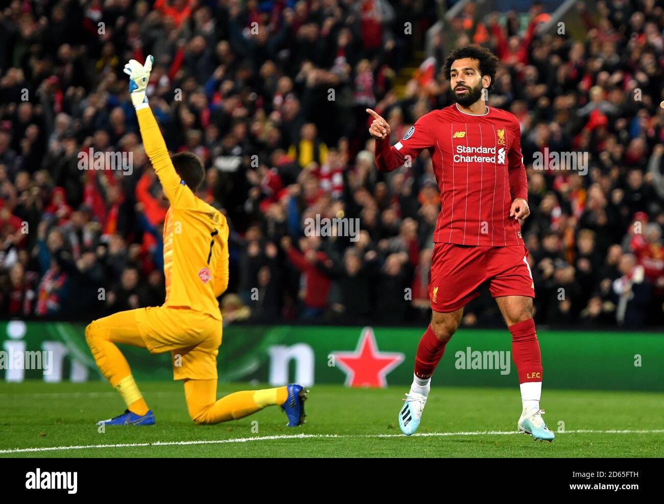 Liverpool's Mohamed Salah celebrates scoreing his side's fourth goal of ...