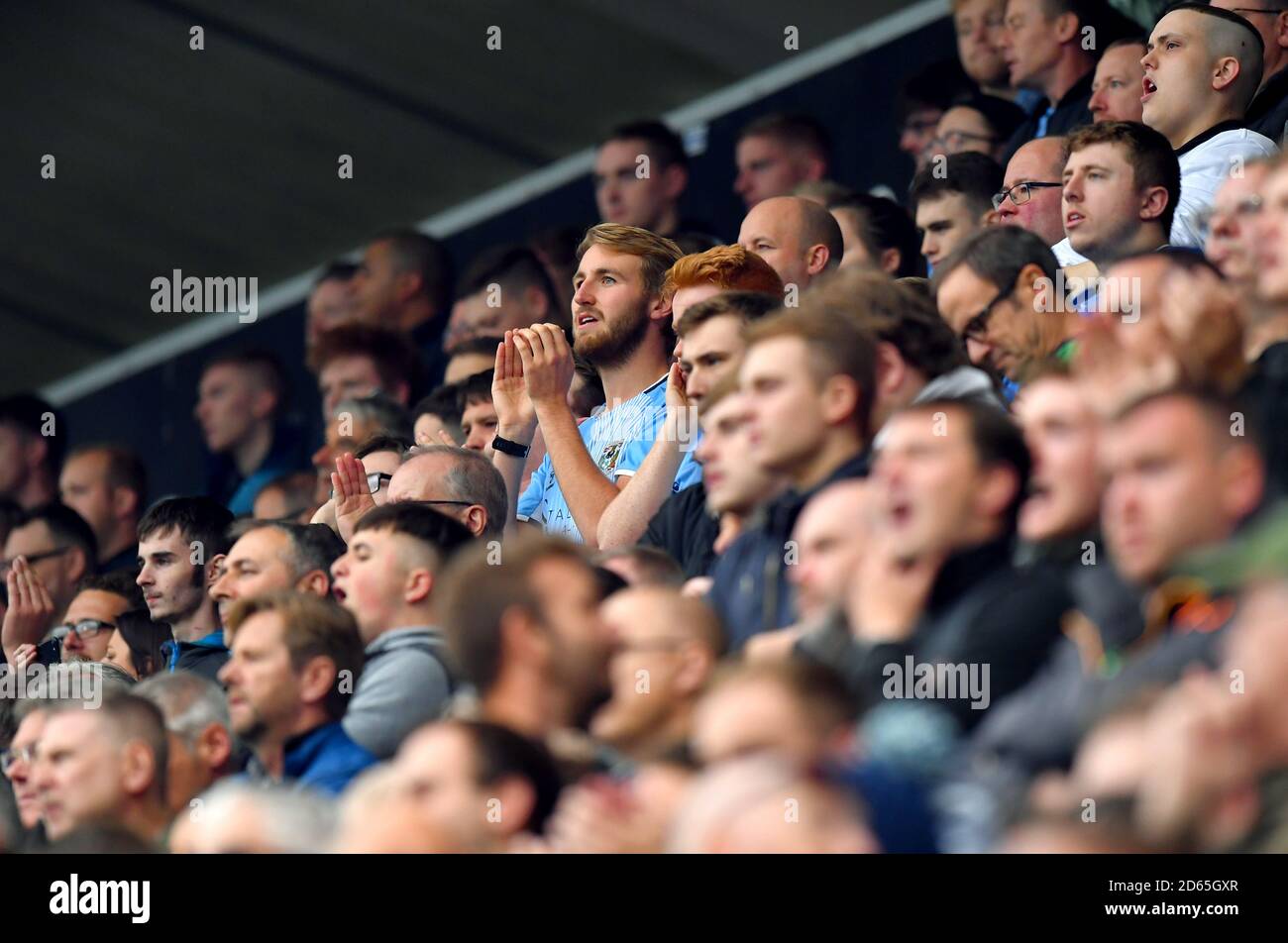 Coventry City fans in the stands Stock Photo - Alamy