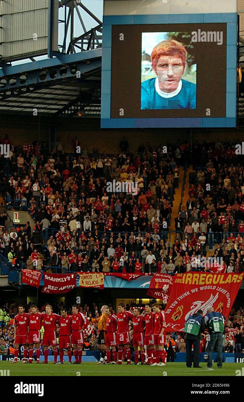 Liverpool players play tribute to the late Alan Ball as he is shown on ...