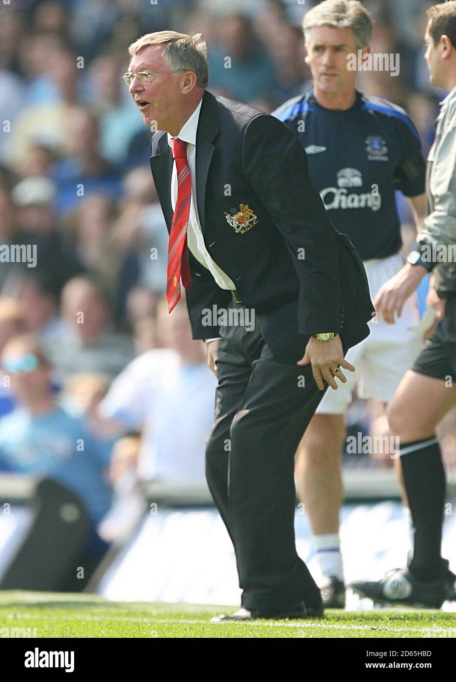 Manchester United's manager Alex Ferguson shouts from the touchline ...