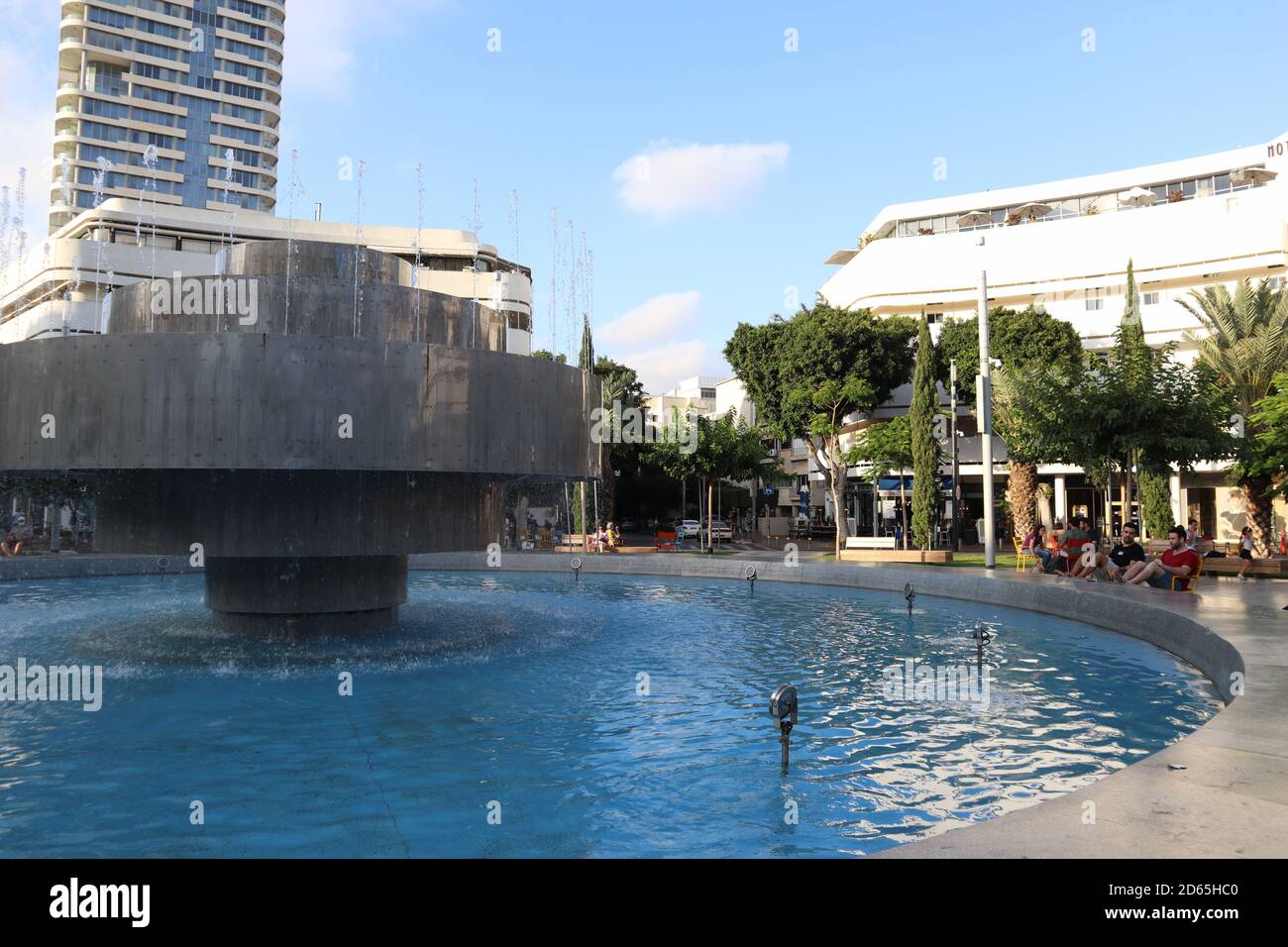 Art water fountain in an urban city square Stock Photo - Alamy