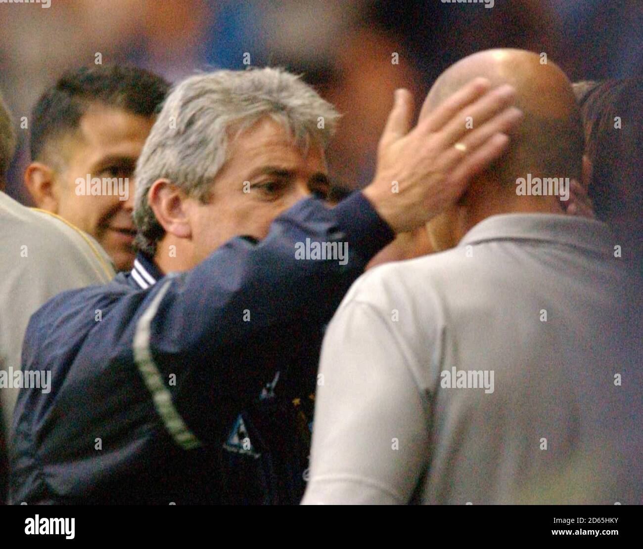 l-r Manchester City manager Kevin Keegan consoles Watford manager ...