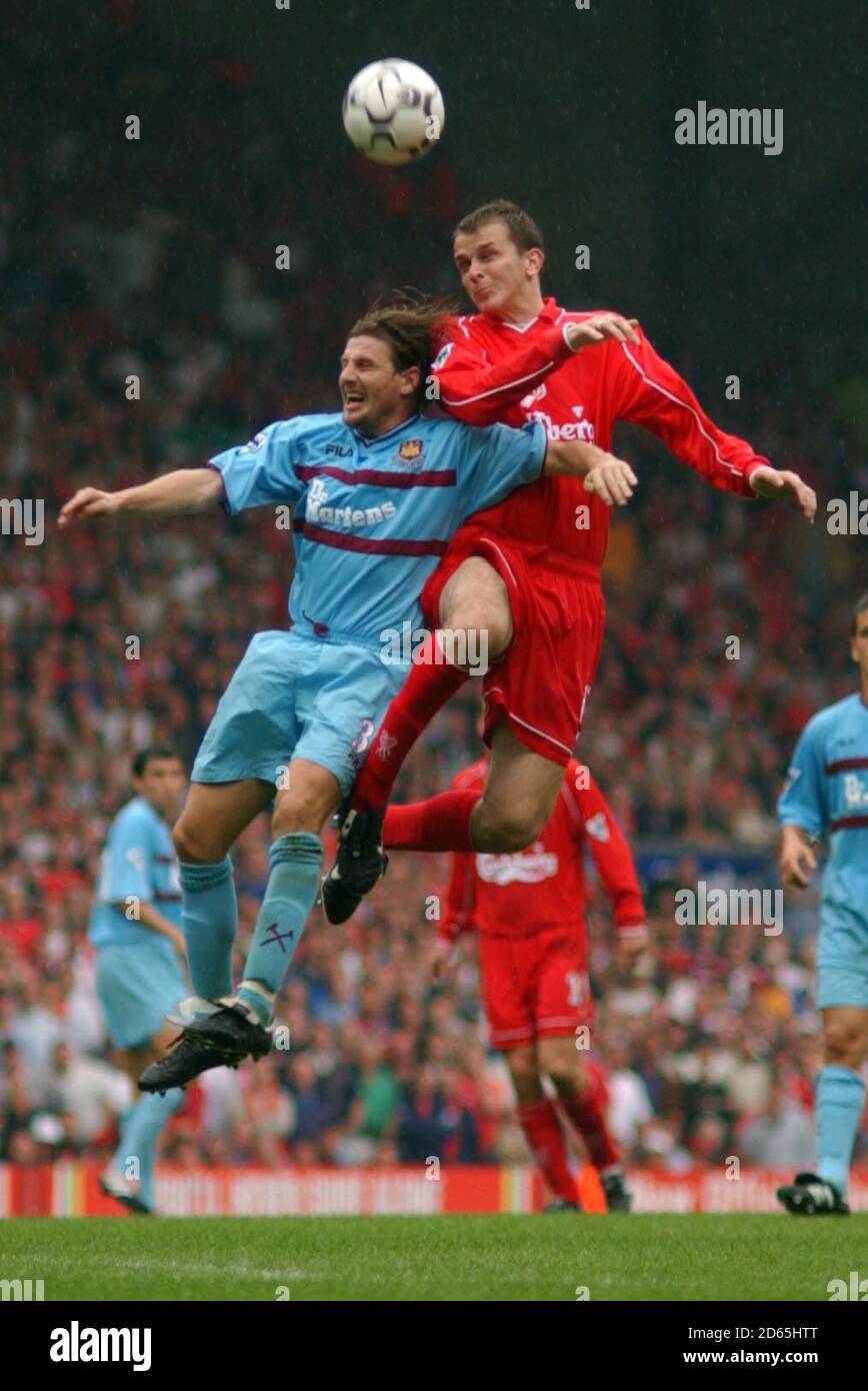 Liverpool's Dietmar Hamann jumps with West Ham United's Sebastien ...