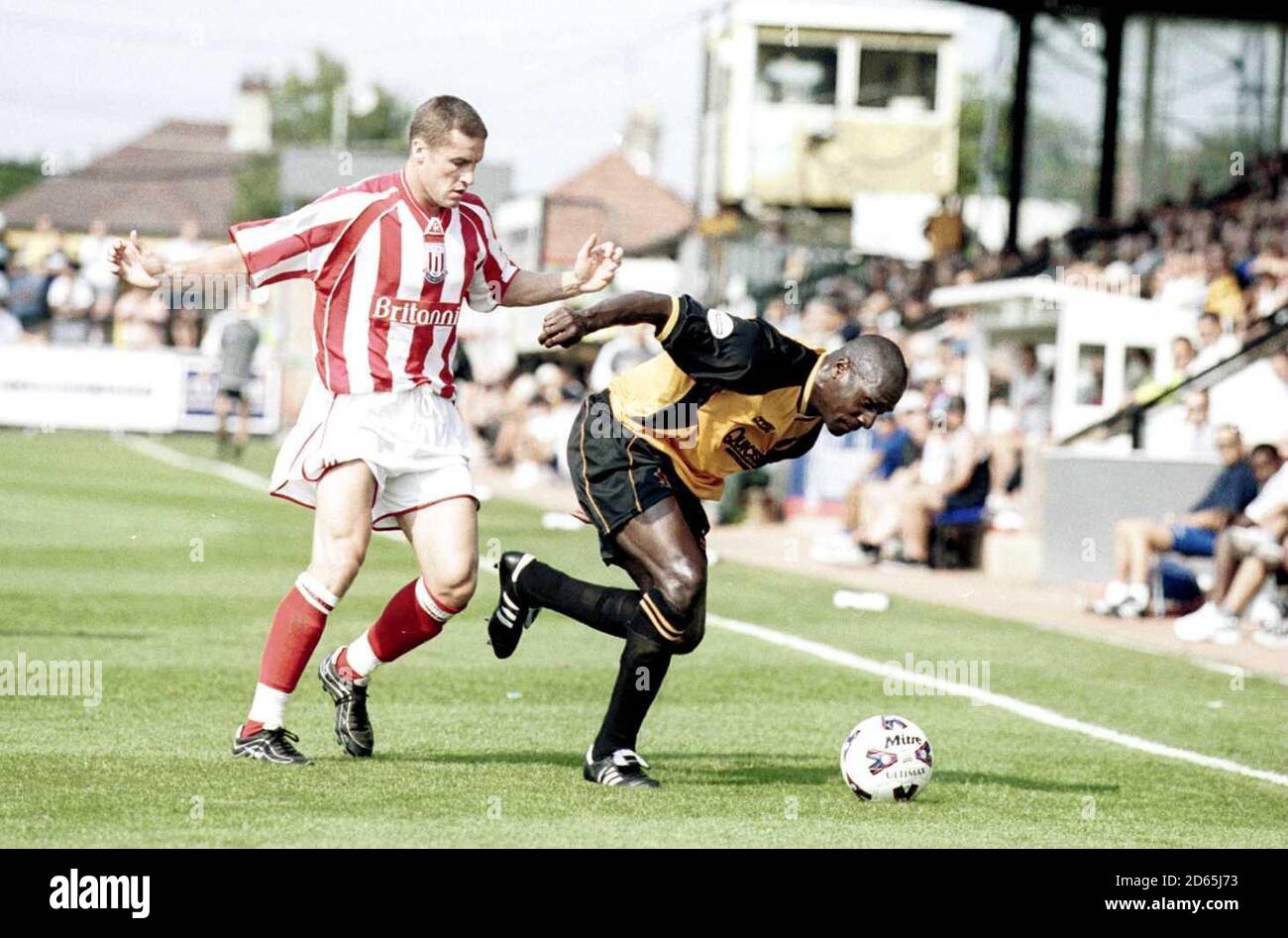 Stoke City's Andy Cooke and Cambridge United's Dean Walling battle for ...